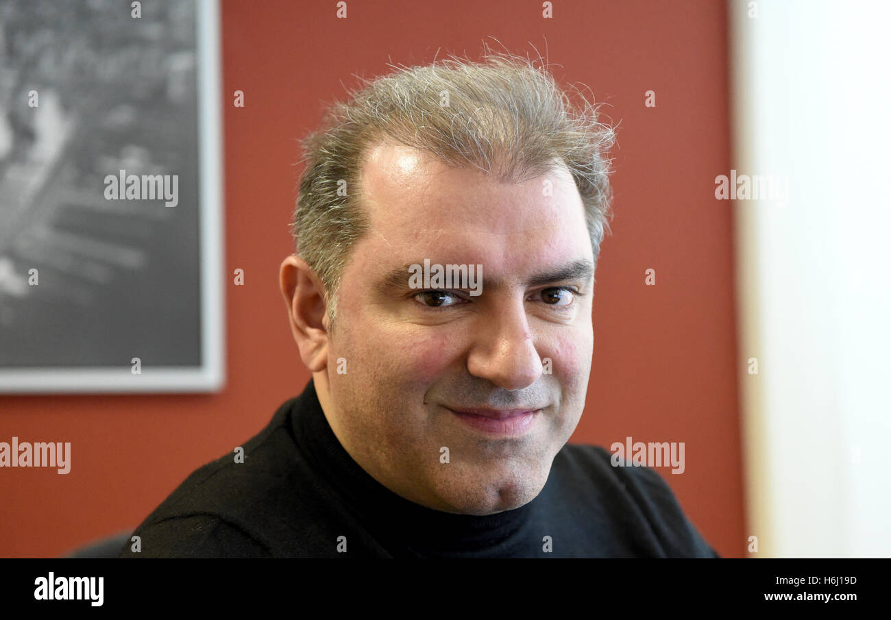 Kiel, Germany. 7th Oct, 2016. Software architect Atilla Tasbasi sitting ...