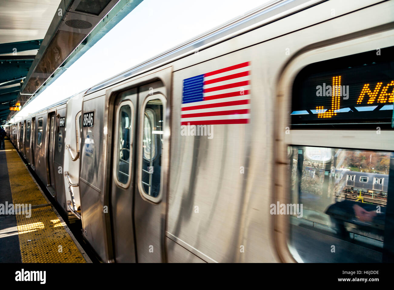 J train subway arriving to the station in New-York Stock Photo - Alamy