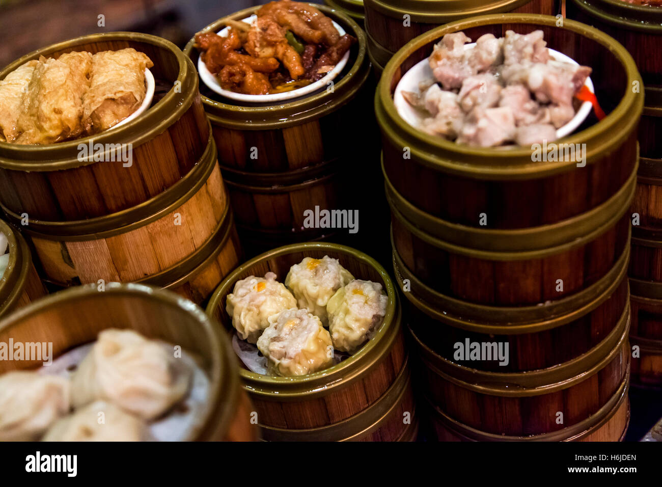 Stacks of Chinese food dishes on a cart in a traditional Chinese ...