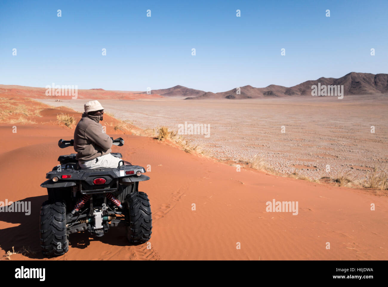 Quad-biking on the dunes in the Namib-Naukluft National Park, Namibia ...