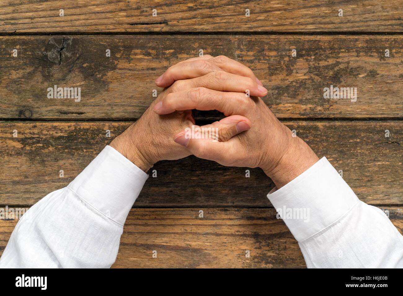 Hands interlaced hi-res stock photography and images - Alamy