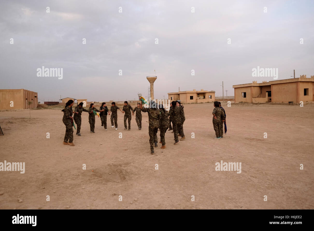 Kurdish fighters of the People's Protection Units YPG and female ...
