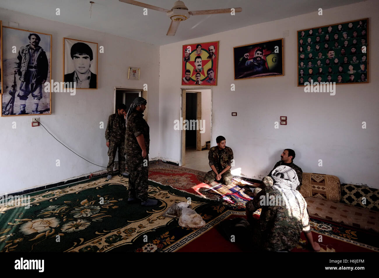 Fighters of the YPG Kurdish People's Protection Unit inside their camp ...