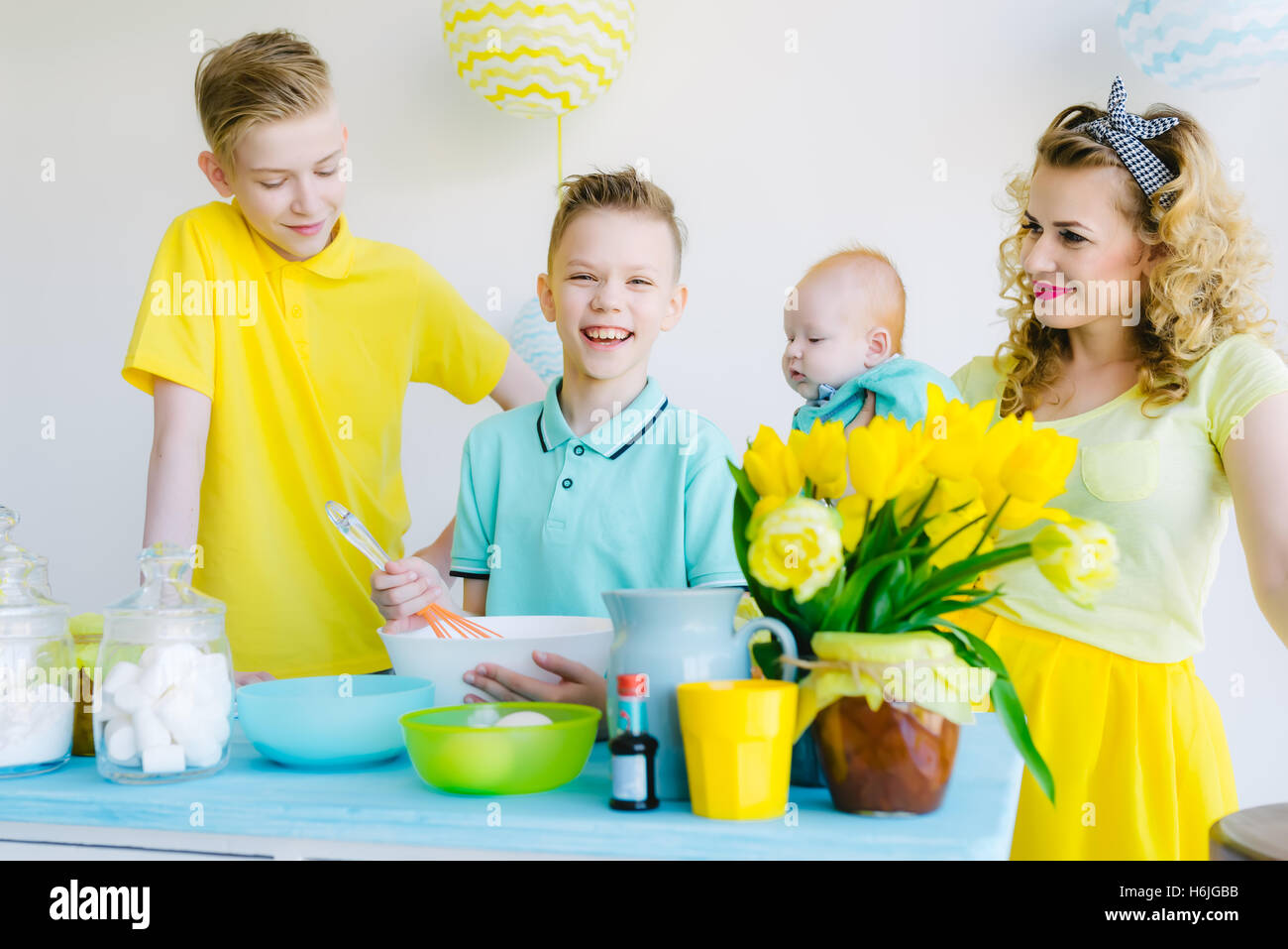 The family makes baking in the kitchen Stock Photo - Alamy