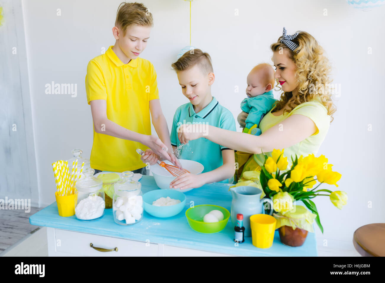 The family makes baking in the kitchen Stock Photo - Alamy