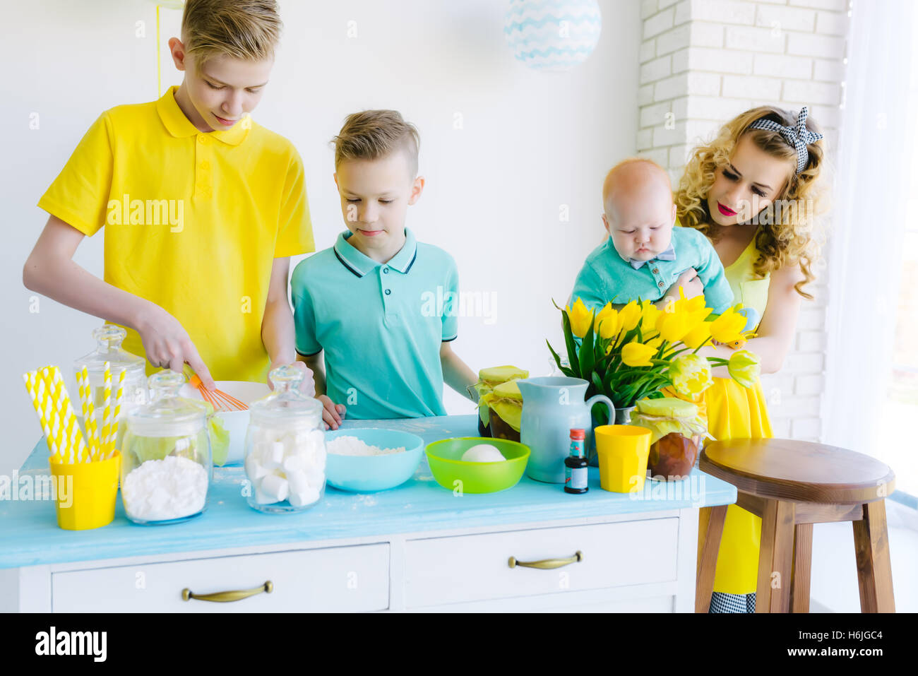 The family makes baking in the kitchen Stock Photo - Alamy