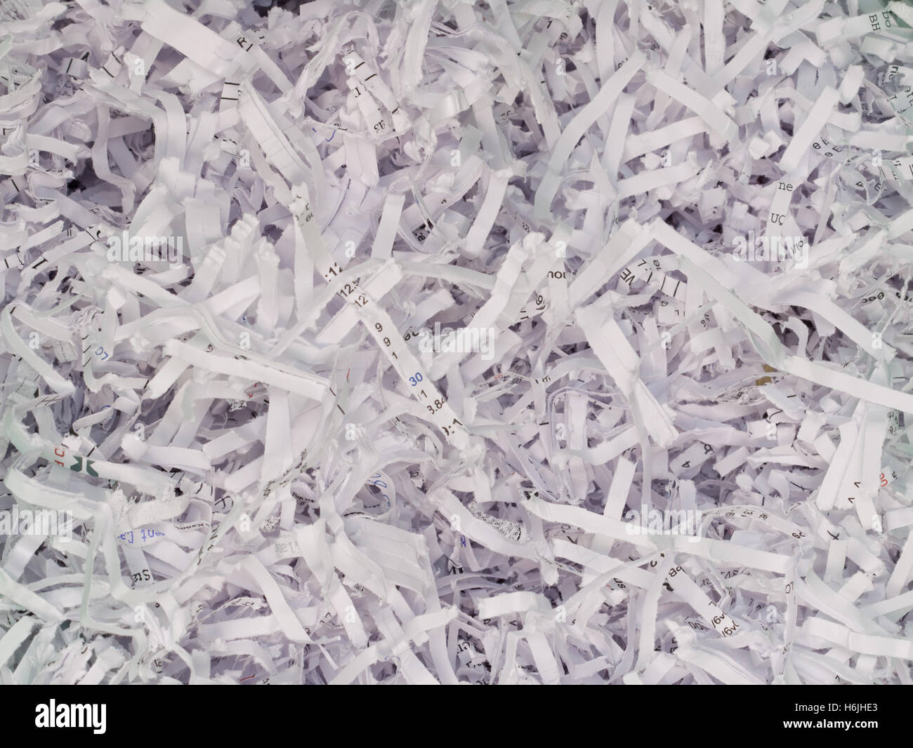 Close upof the remains of papers destroyed by shredding Stock Photo - Alamy