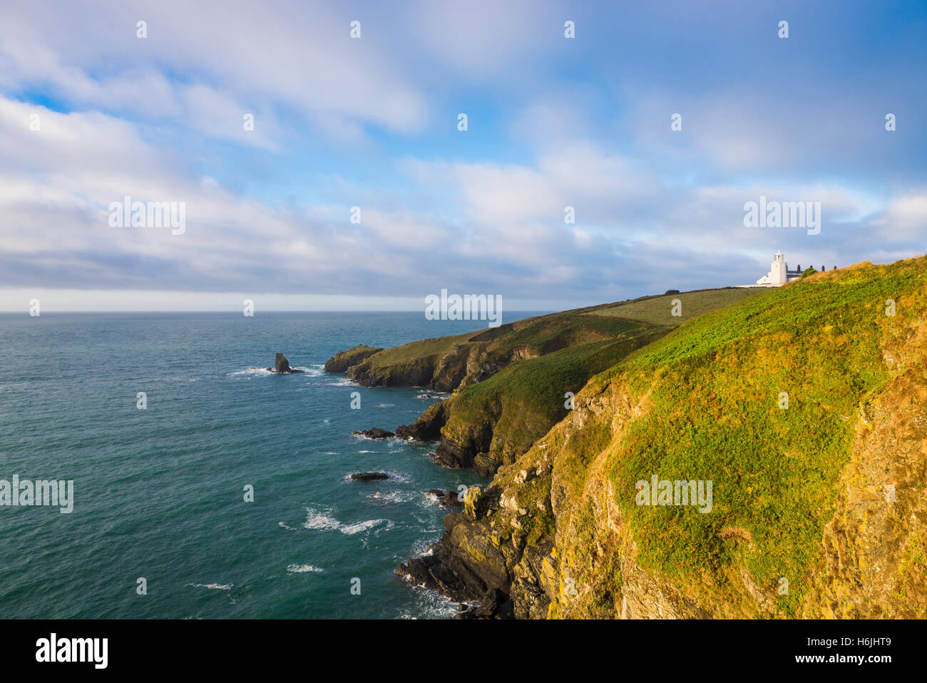 Lizard Point lighthouse seen from Housel bay at Cornish south coast ...