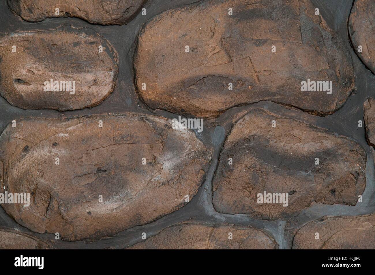 Wall round stone rock texture Stock Photo - Alamy