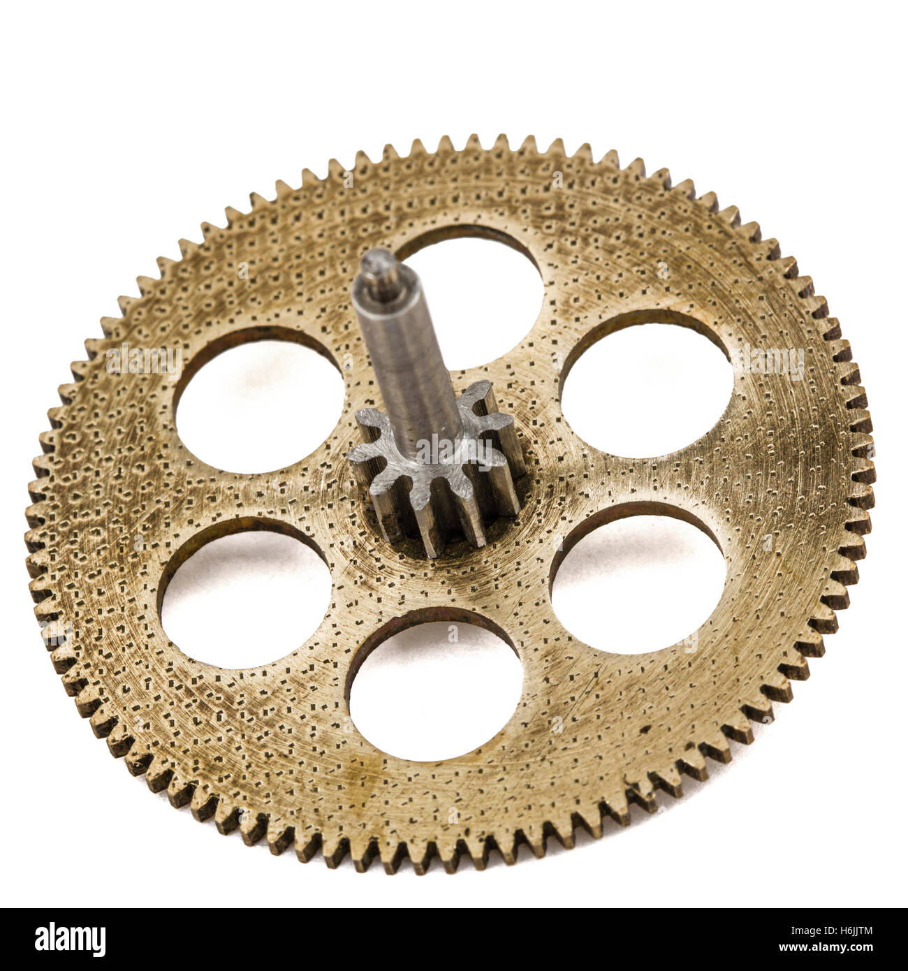 One gear wheel from brass closeup, isolated on white background Stock ...