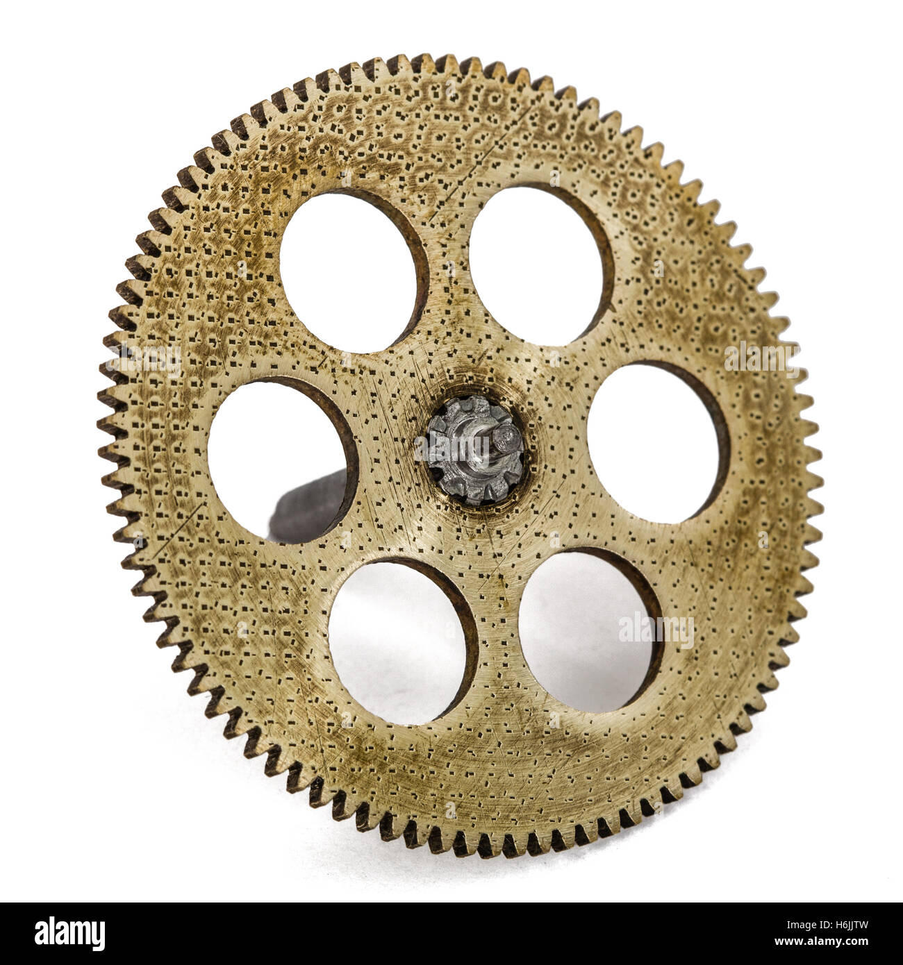 One gear wheel from brass closeup, isolated on white background Stock ...