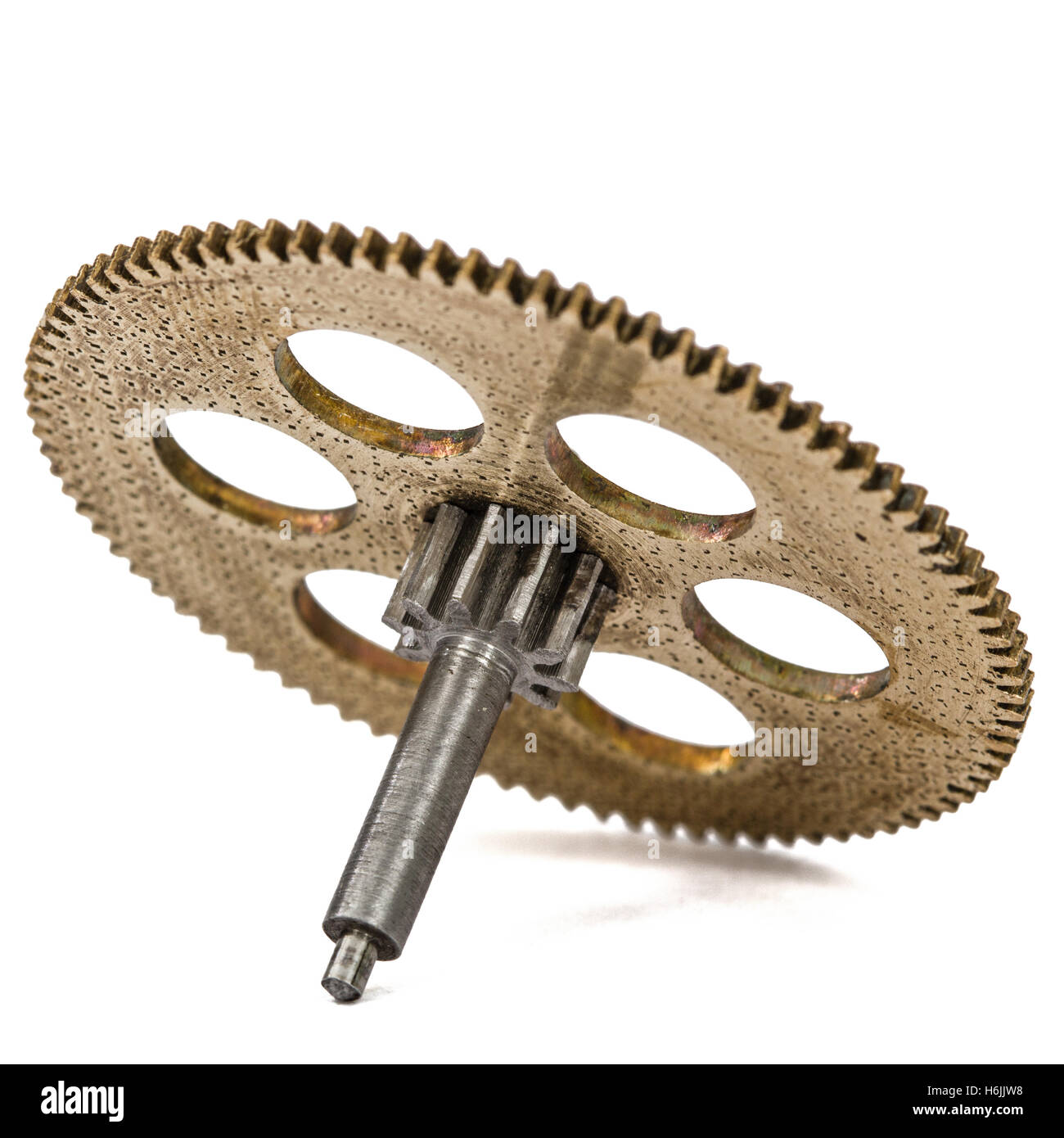 One gear wheel from brass closeup, isolated on white background Stock ...