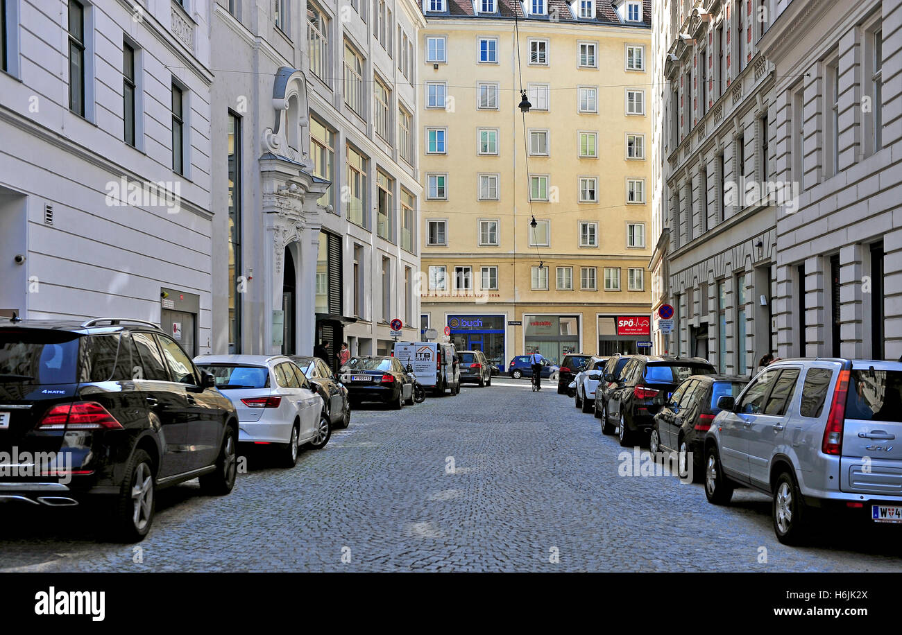 VIENNA, AUSTRIA - JUNE 6: Cars parking in the street in downtown of ...