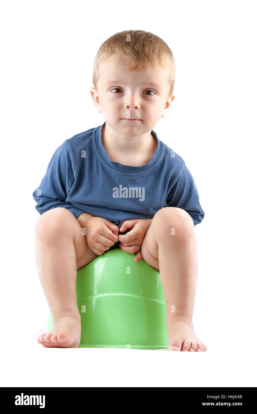 cute smiling child on a pot on a white background Stock Photo - Alamy