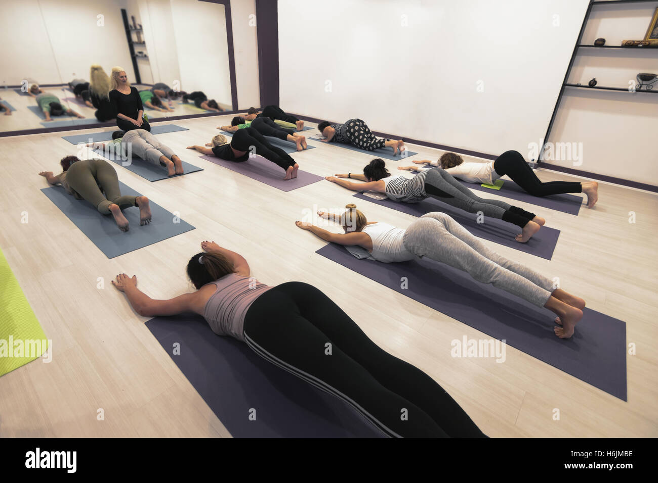 Girls practicing yoga, Chaturanga Dandasana, Four Limbed Staff Pose ...