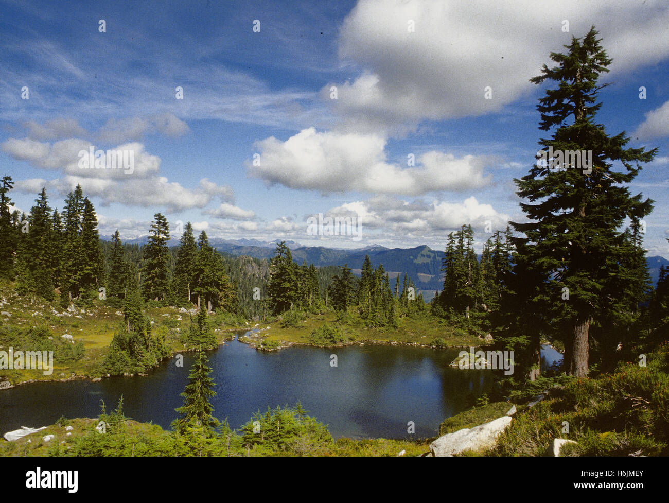 Alpine lake with mountains hi-res stock photography and images - Alamy