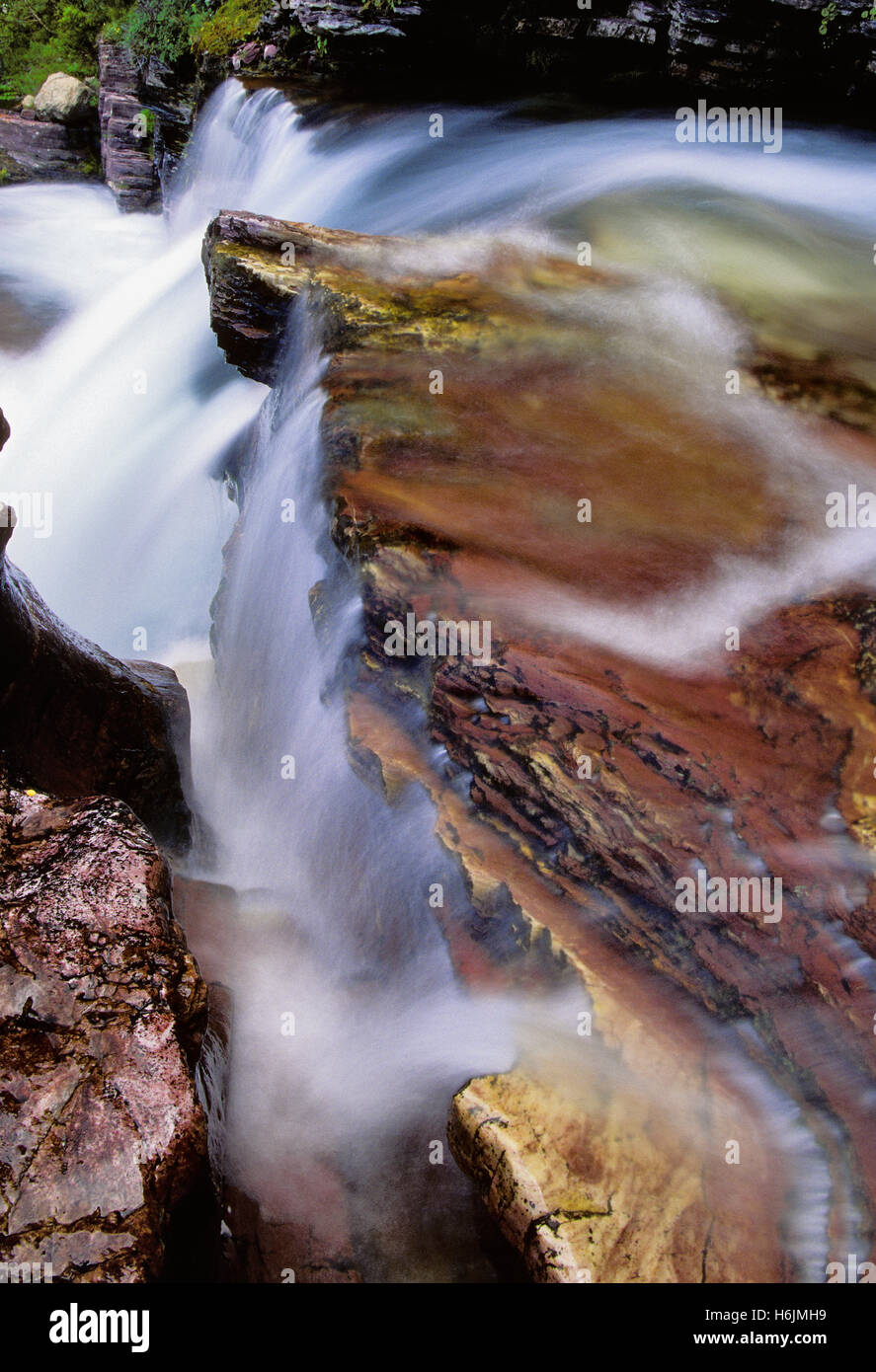 Waterfall over rocks Stock Photo - Alamy