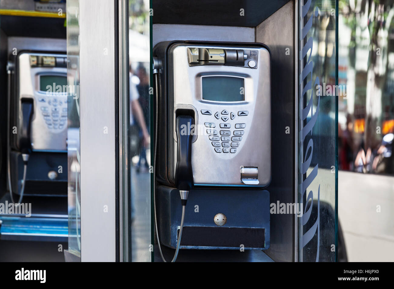 modern payphone on a city street Stock Photo - Alamy