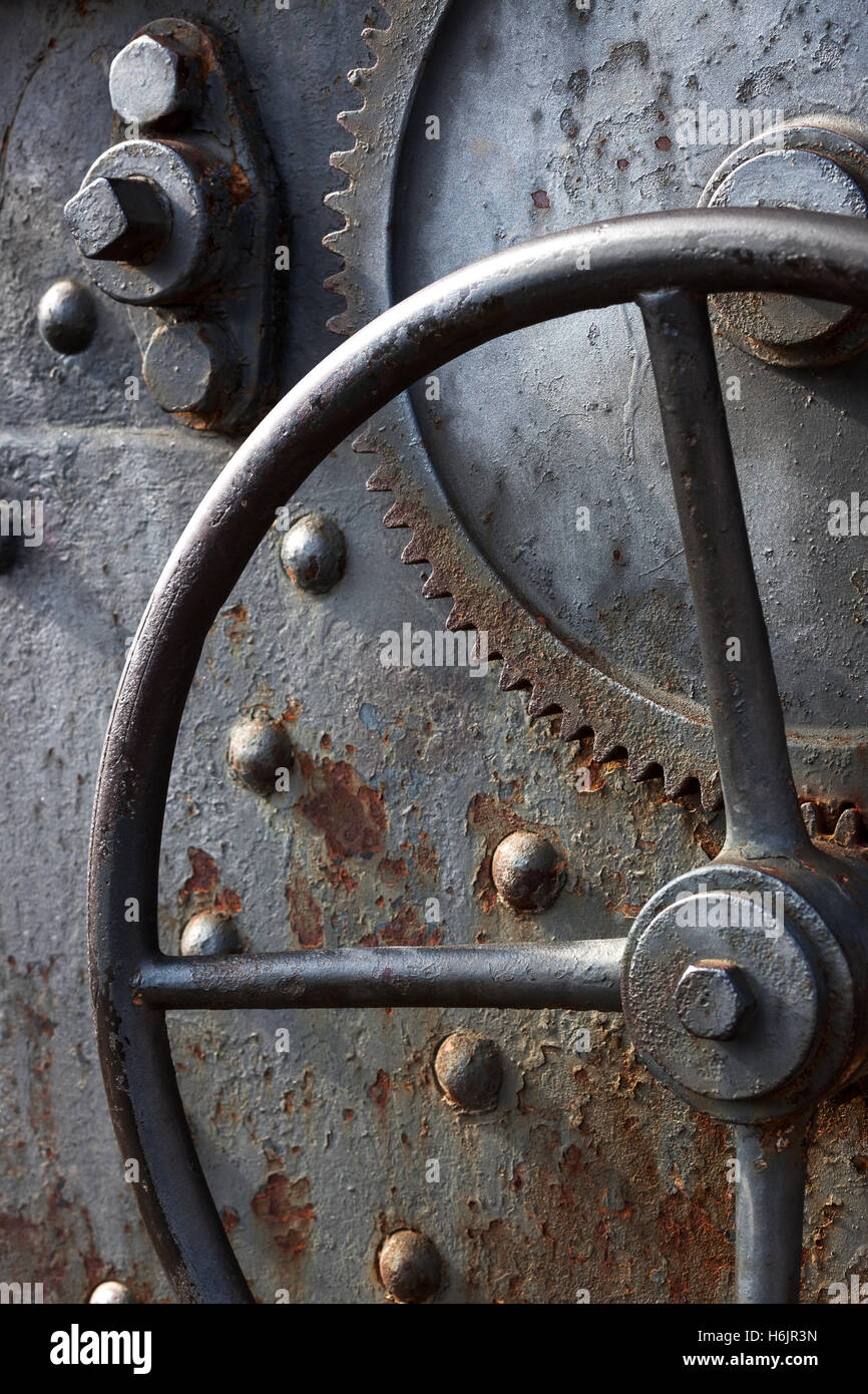 old mechanism with a gear closeup Stock Photo - Alamy