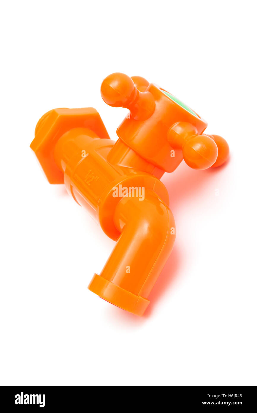 orange plastic faucet on a white background Stock Photo - Alamy