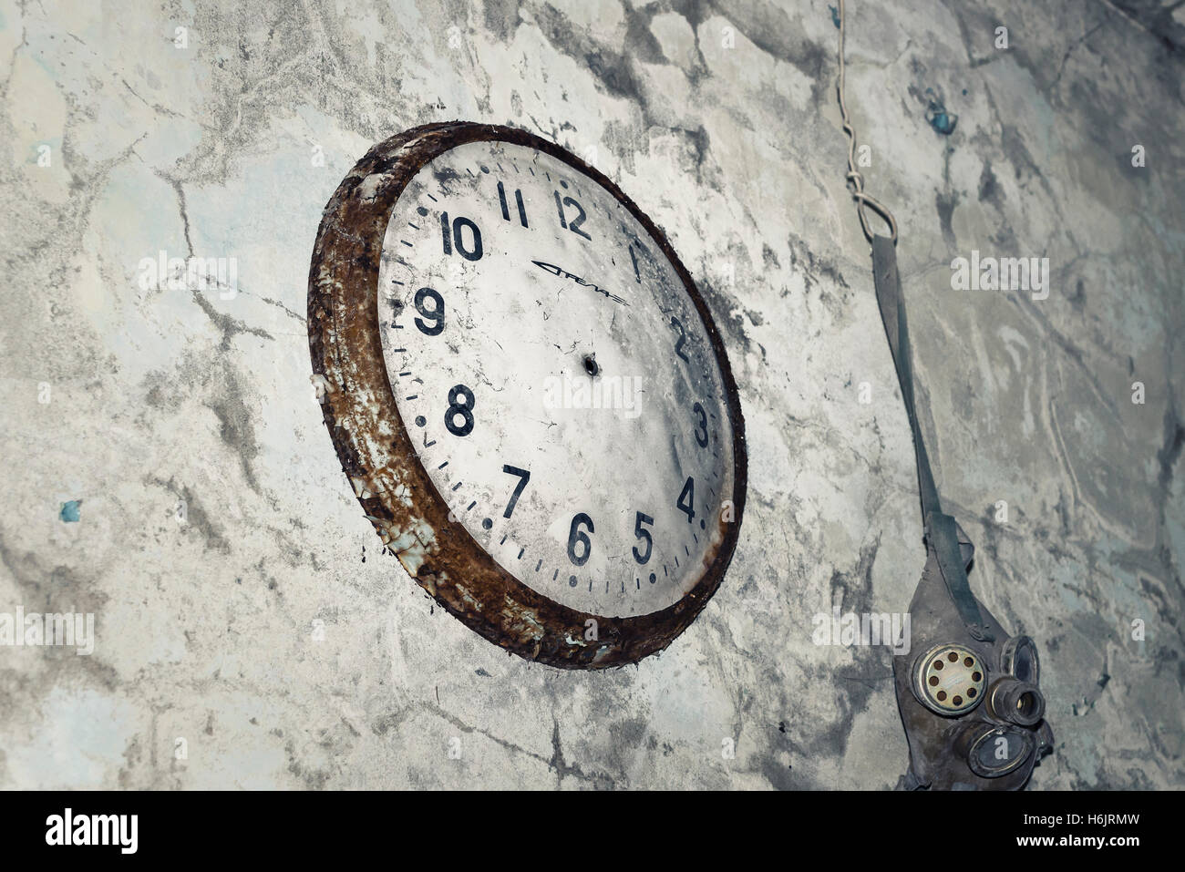 The old clock hanging in abandoned building of Chernobyl Stock Photo ...