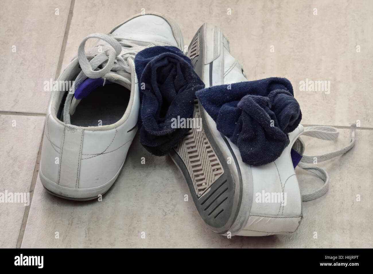 Pair of sneakers and socks after the workout Stock Photo - Alamy