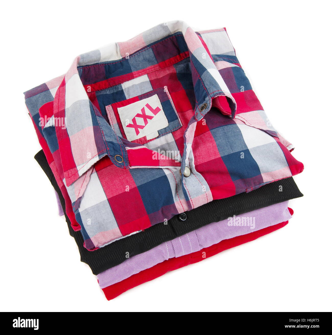 male shirts stack on white Stock Photo - Alamy