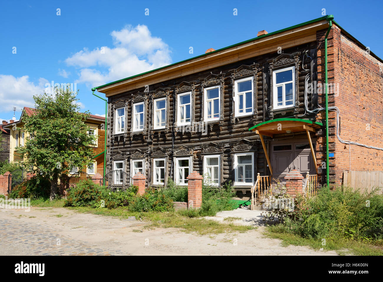 Tomsk, an old wooden houses on the Bakunina Street Stock Photo - Alamy