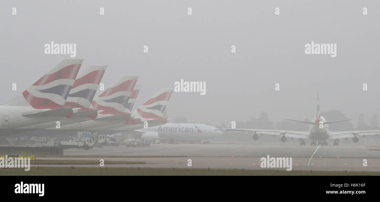 Planes in the fog at Heathrow Airport, London Stock Photo - Alamy