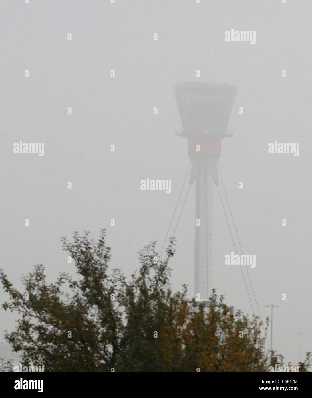 The control tower seen through the fog at Heathrow Airport, London ...
