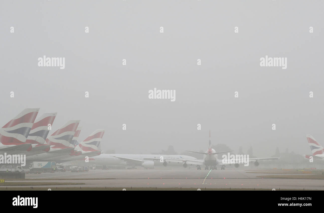 Planes in the fog at Heathrow Airport, London Stock Photo - Alamy
