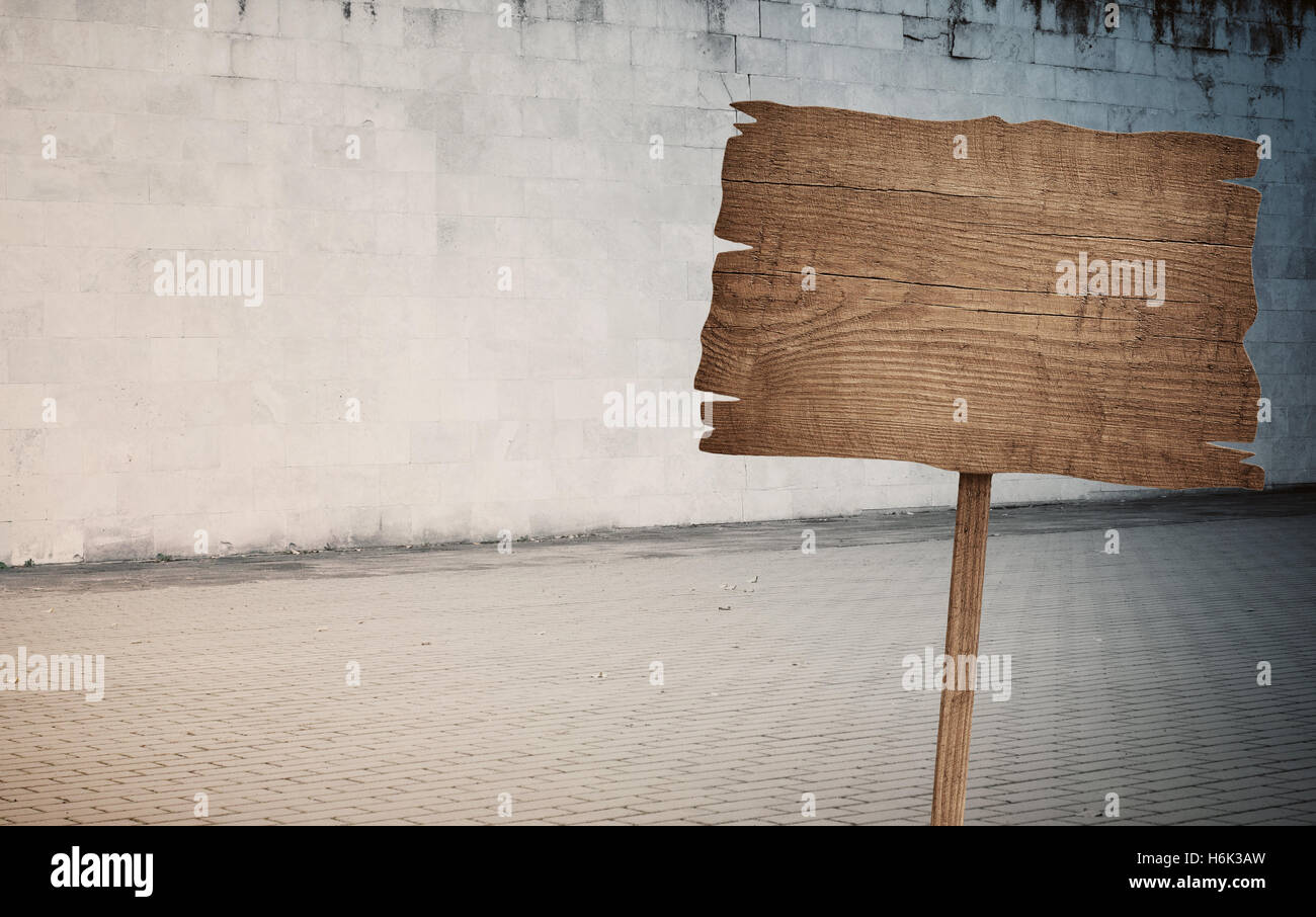 Weathered cinder block, brick wall texture, wood sign and walkway Stock ...