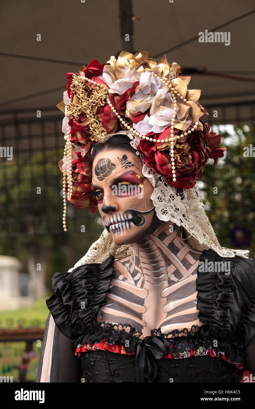 Skeleton woman performer at Dia de los Muertos, Day of the dead, in Los ...
