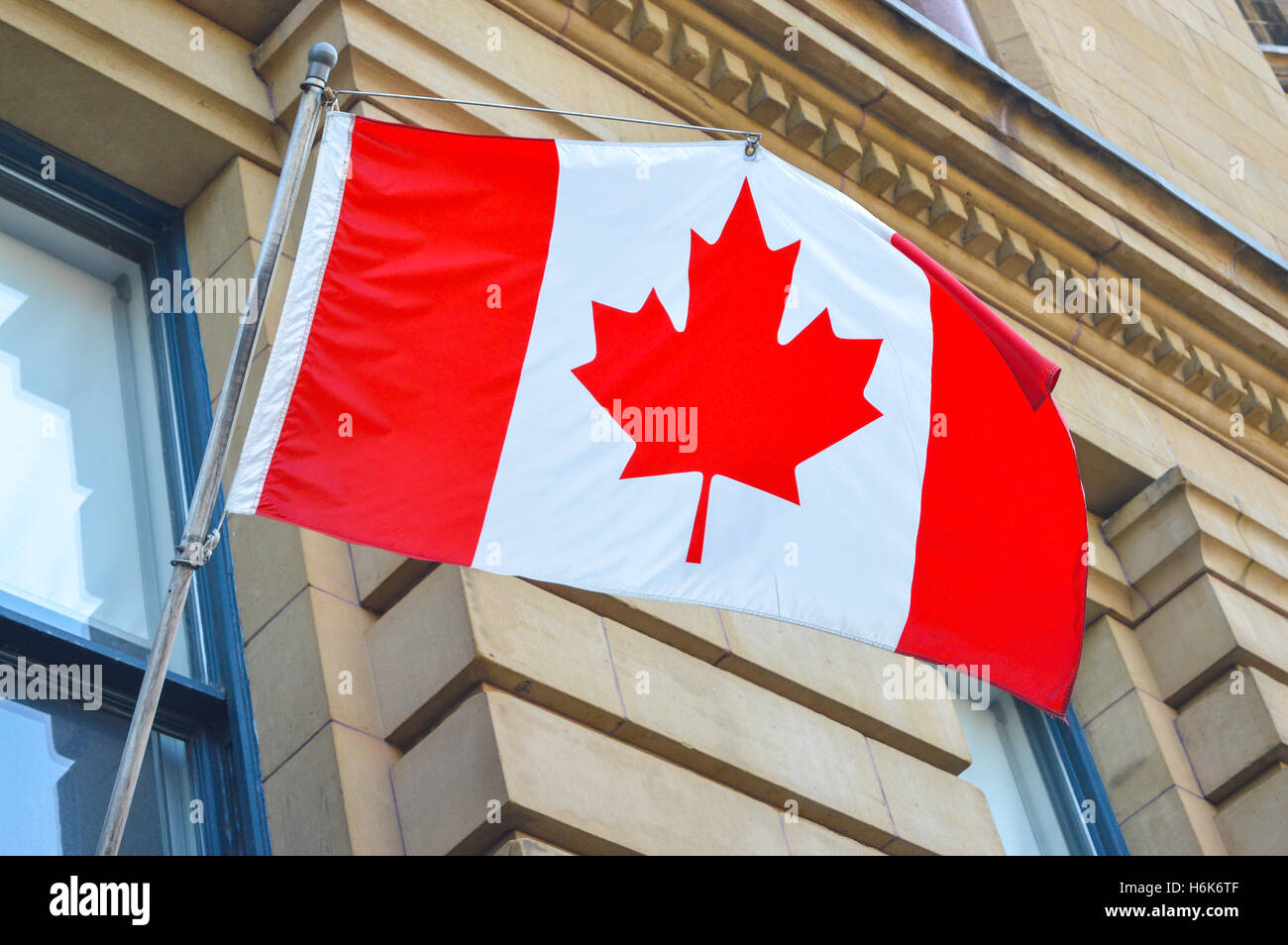 Building with canadian flag in window hi-res stock photography and ...