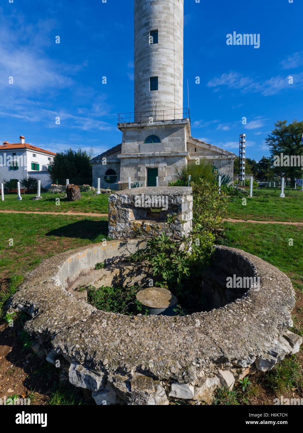 Lighthouse and remains of ww2 era coastal bunker Stock Photo - Alamy