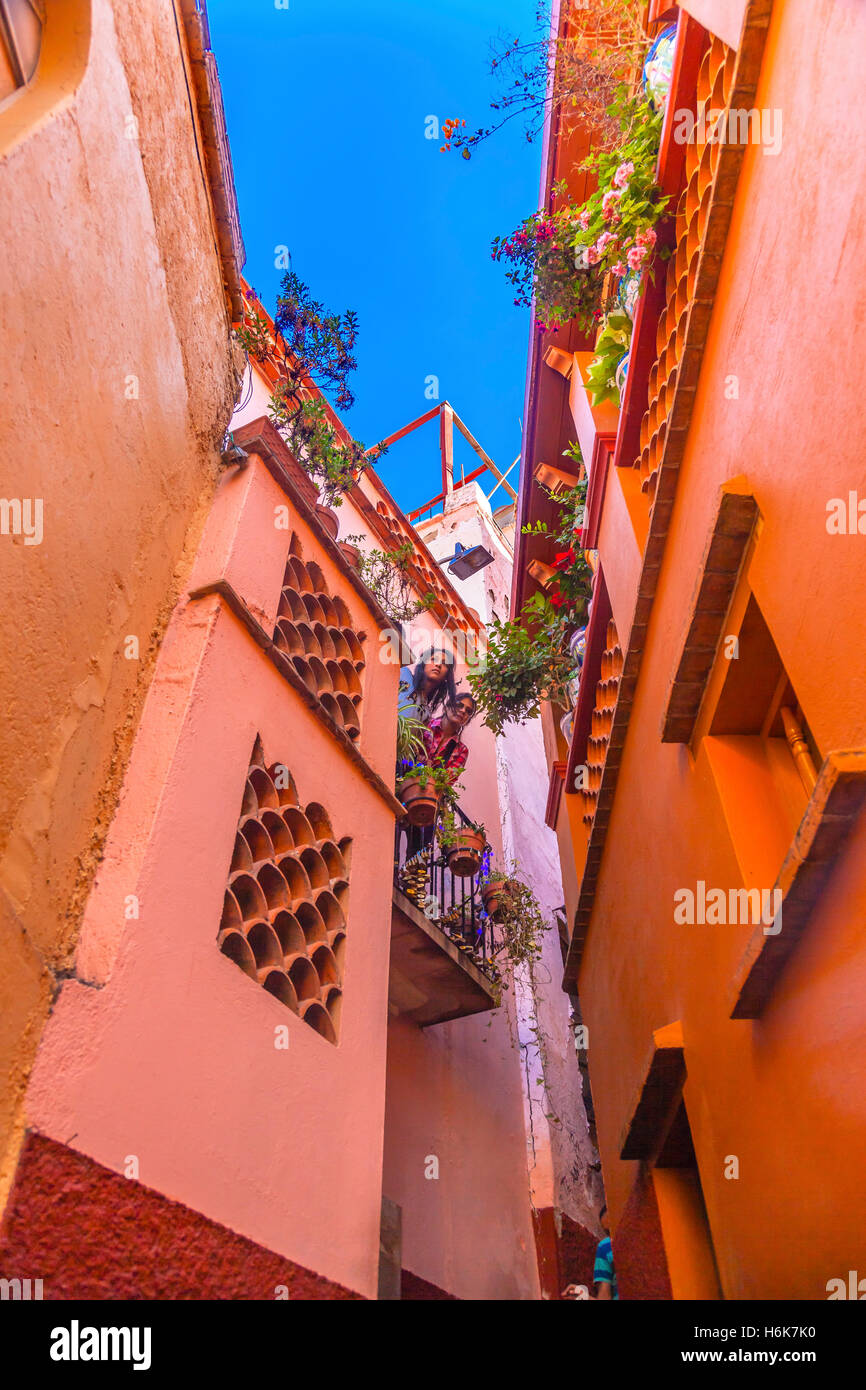 Kiss Alley Alleyway People Colored Houses Guanajuato Mexico. Houses so close couple can exchange ...