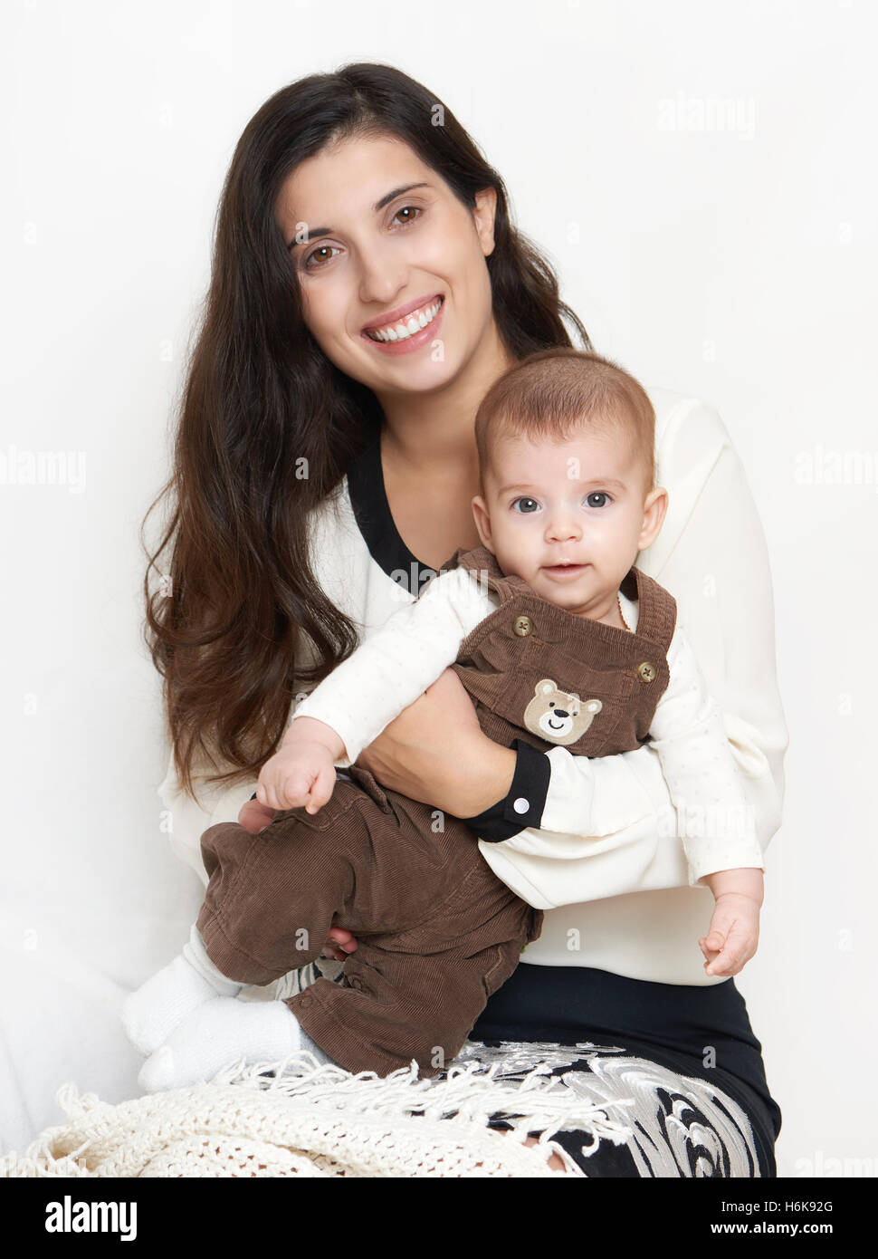 Mother with baby, happy family portrait on white background Stock Photo ...