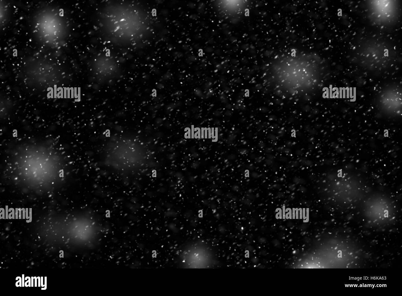 Snowfall on black background - winter design element Stock Photo - Alamy