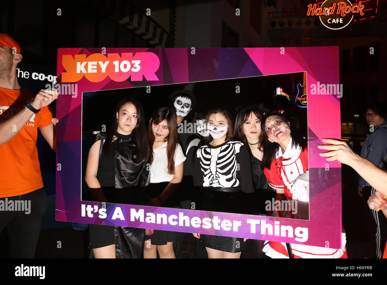 Manchester, UK. 30th Oct, 2016. a group of friends pose for a photo in ...