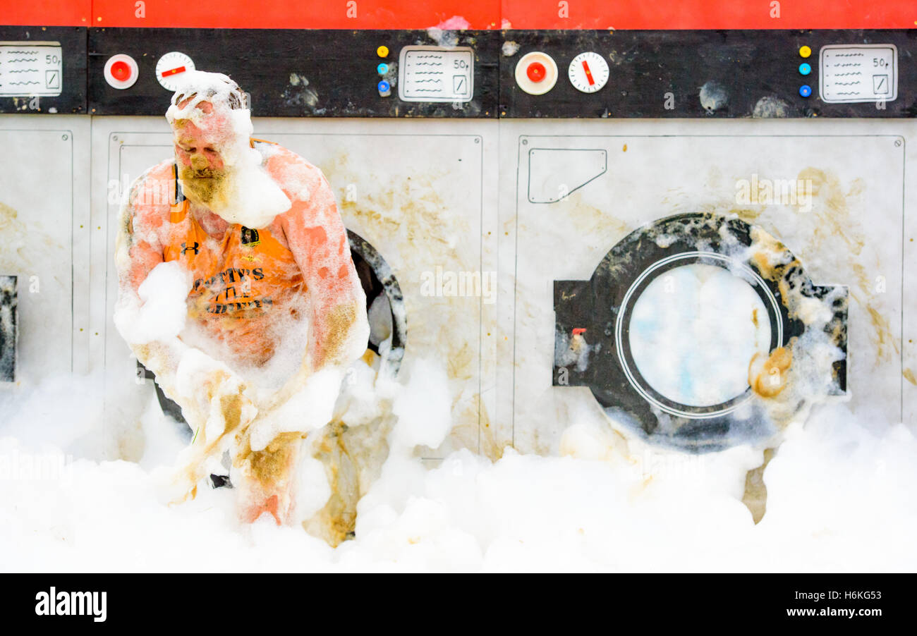Silverstone, Milton Keynes, UK. October 29th 2016. Runners emerge from ...