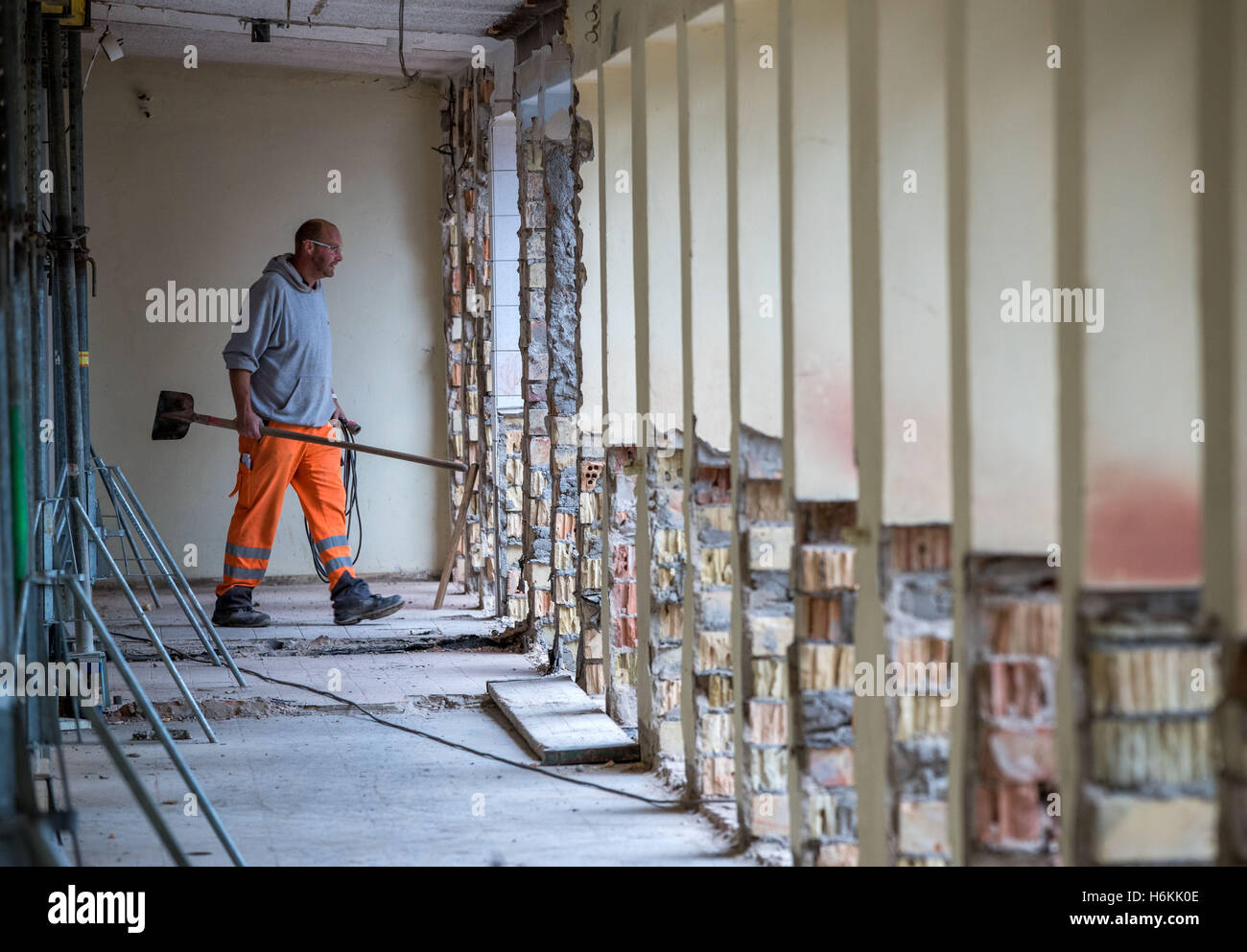 A man works in the former 'people's swimming pool' in the district of ...