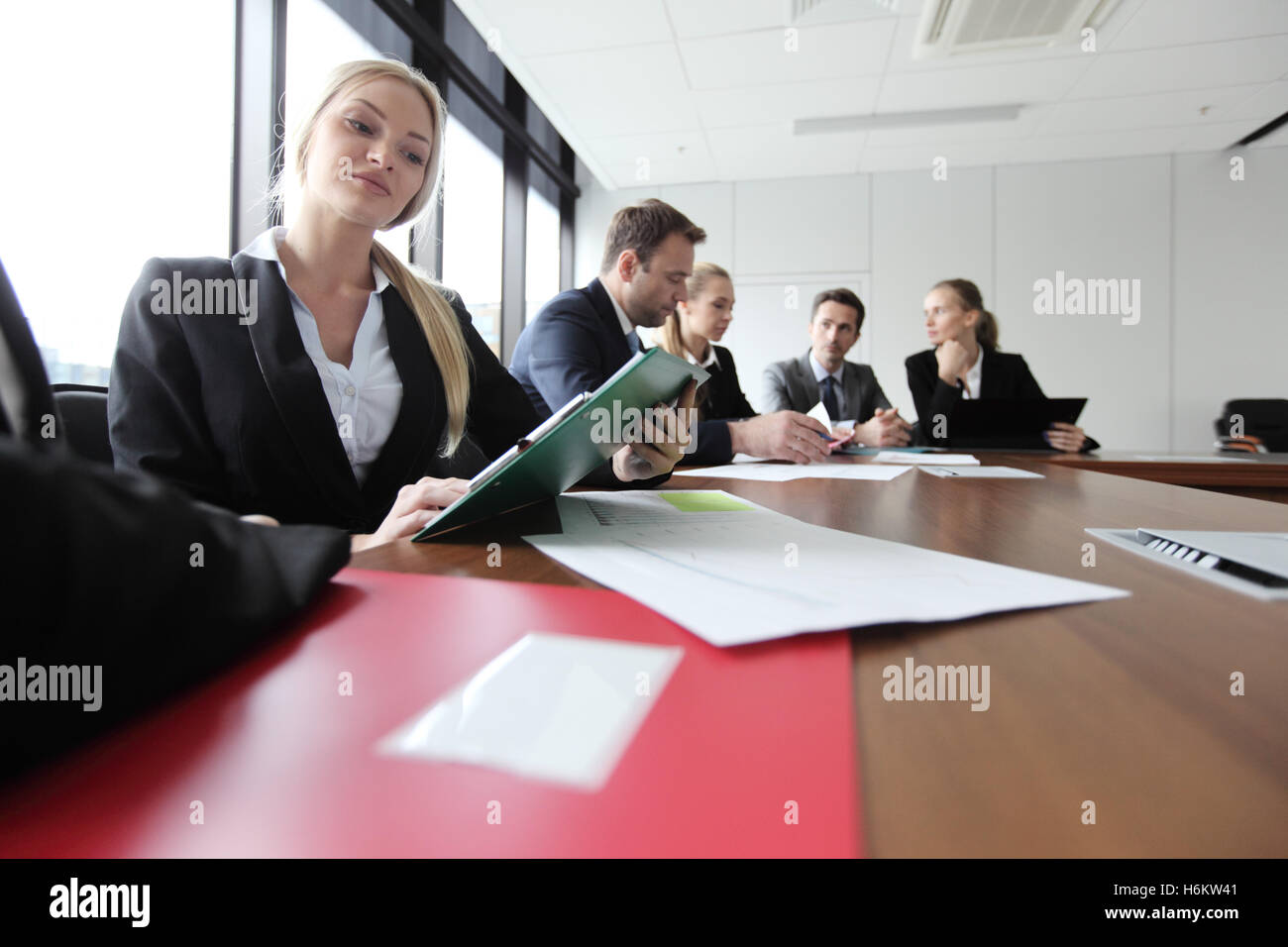 Business team work with documents together in office Stock Photo - Alamy