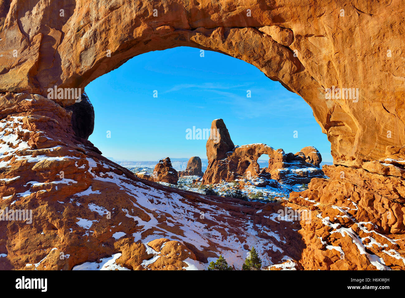 Turret Arch seen through North Window Arch in Arches National Park ...