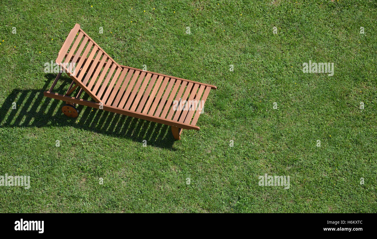 Easy chair on a lawn shot from above Stock Photo - Alamy