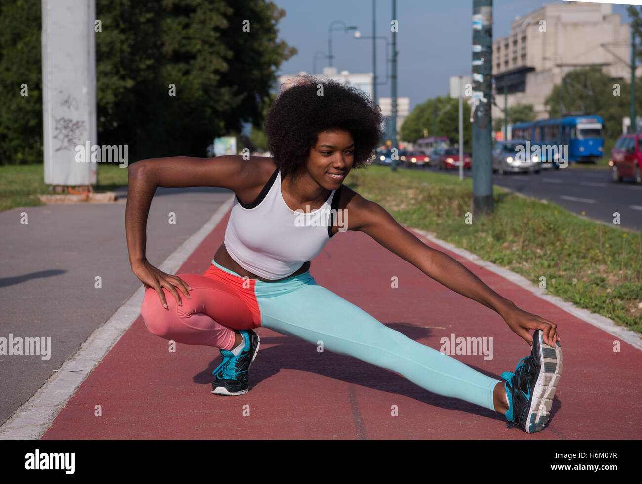Portrait Of A Young Beautiful African American Girl Doing Stretching Portrait Of A Young Beautiful African American Girl Doing Stretching