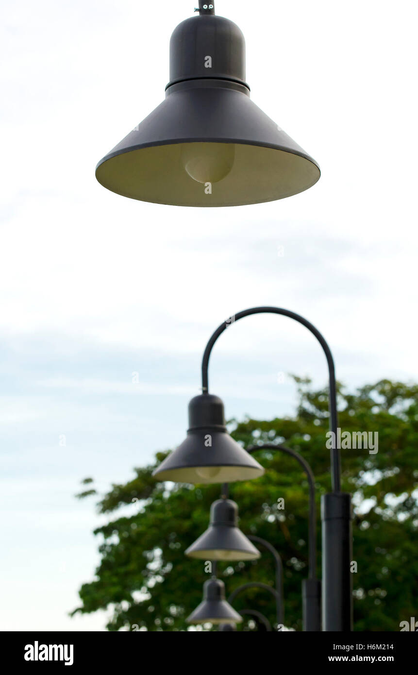 Lamp Park is lined up on the sidewalk in the park Stock Photo - Alamy