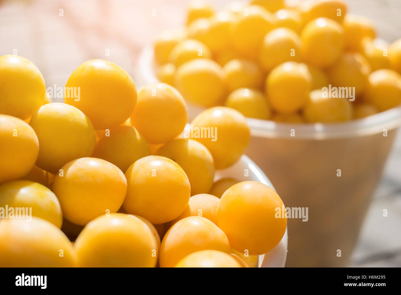 Small yellow fruit Stock Photo - Alamy
