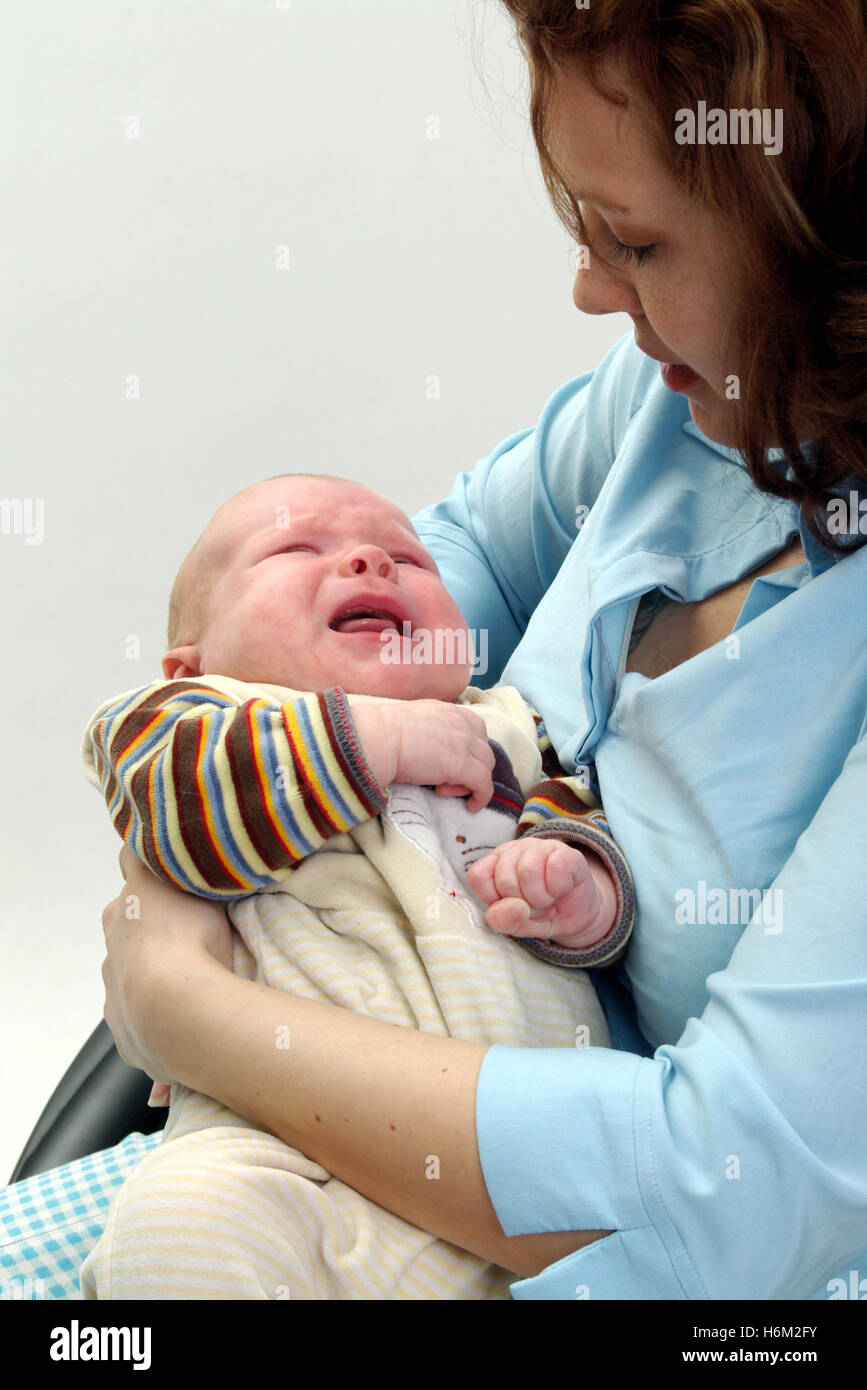 mother with crying baby Stock Photo - Alamy