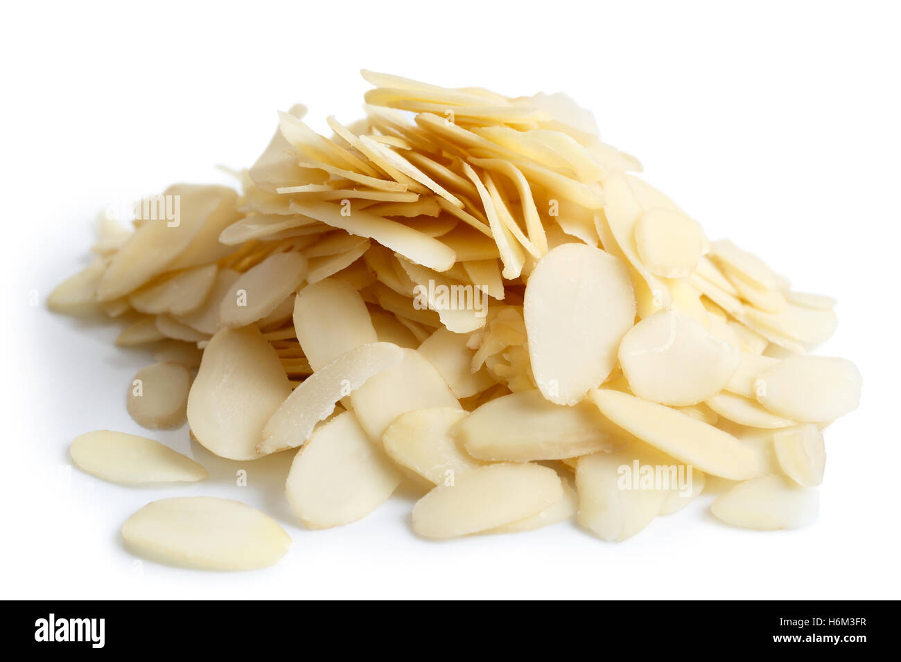 Pile of peeled flaked almonds isolated on white Stock Photo - Alamy
