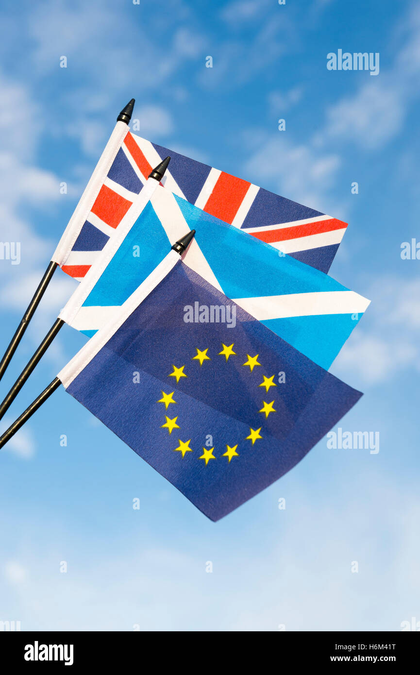Scottish, UK, and EU flags flying together in bright blue sky Stock ...